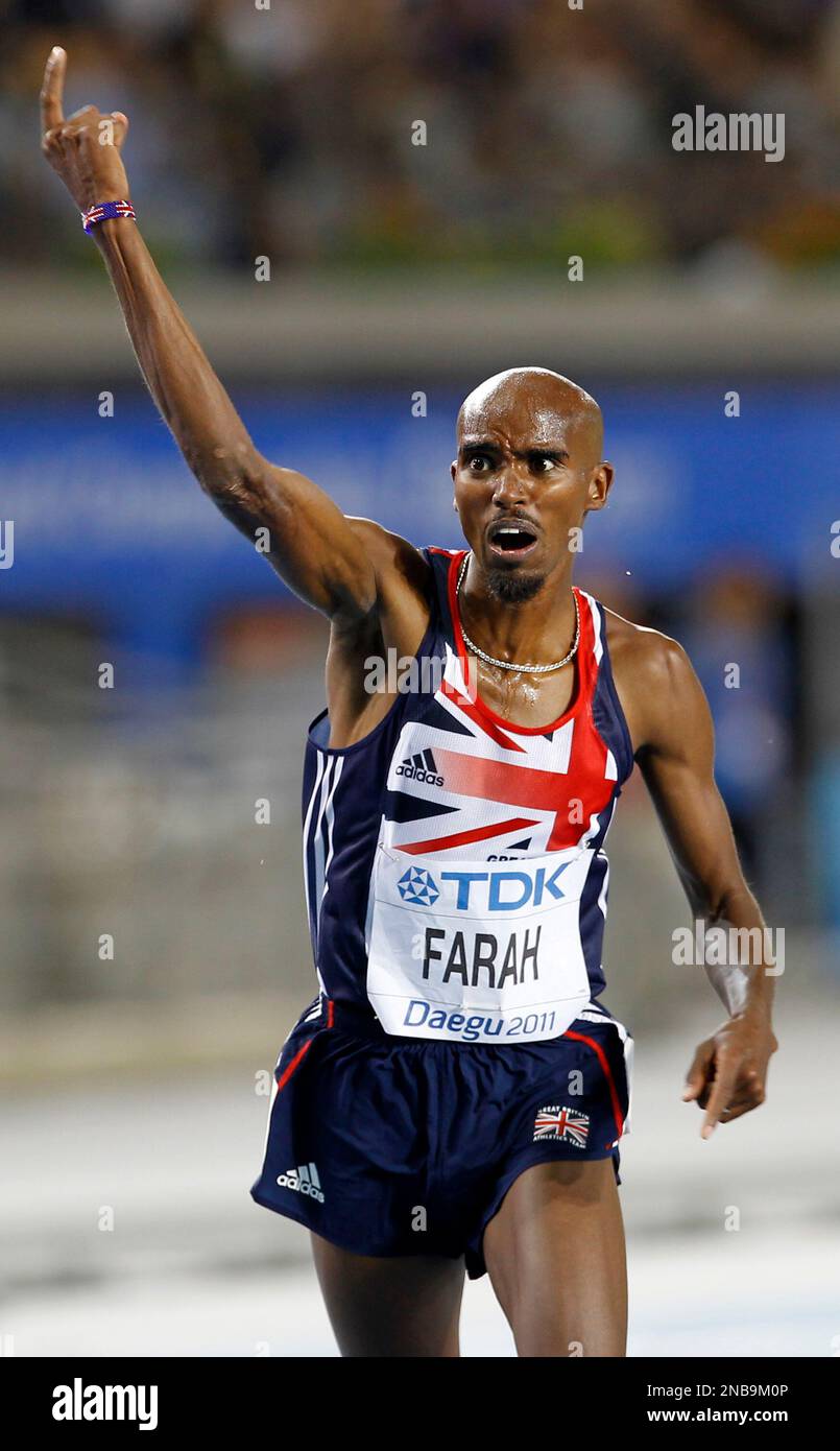 Britain's Mo Farah crosses the finish line, winning the gold medal in ...