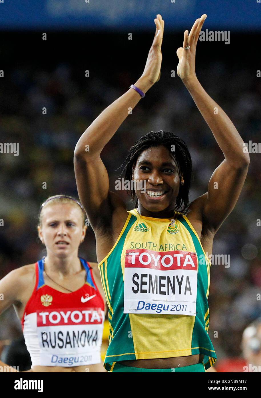 South Africa's Caster Semenya, right, celebrates placing second in the ...