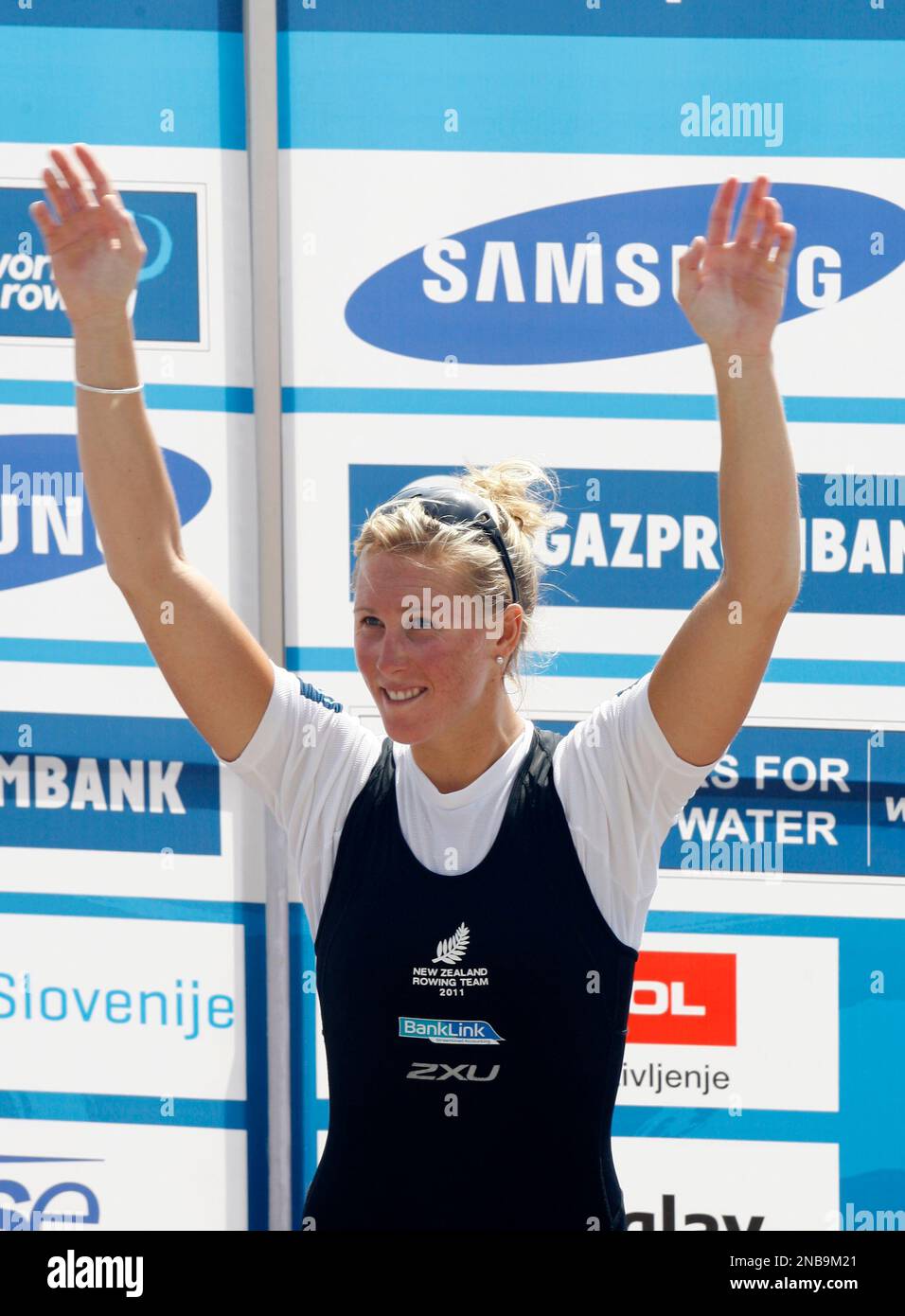 Third placed Emma Twigg of New Zealand celebrates on the podium of the ...