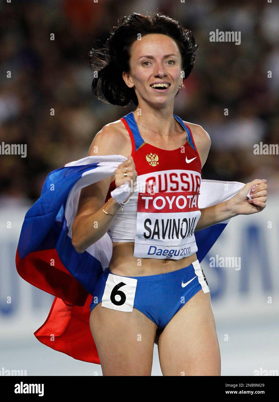 Russia's Mariya Savinova celebrates winning the Women's 800m final at ...
