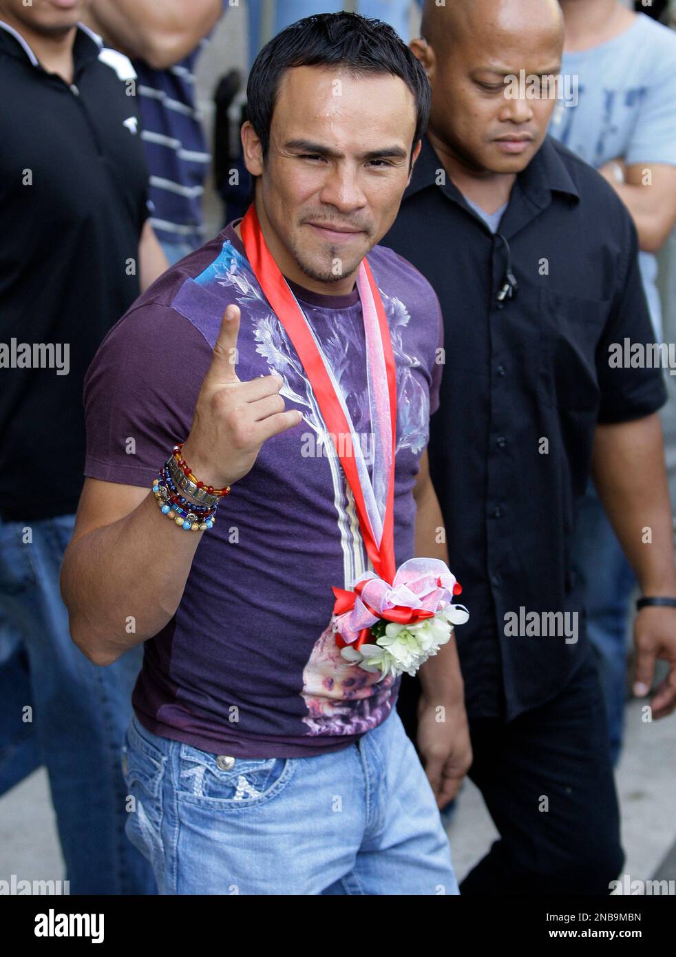 Mexican boxer Juan Manuel Marquez gestures after attending a mass at ...