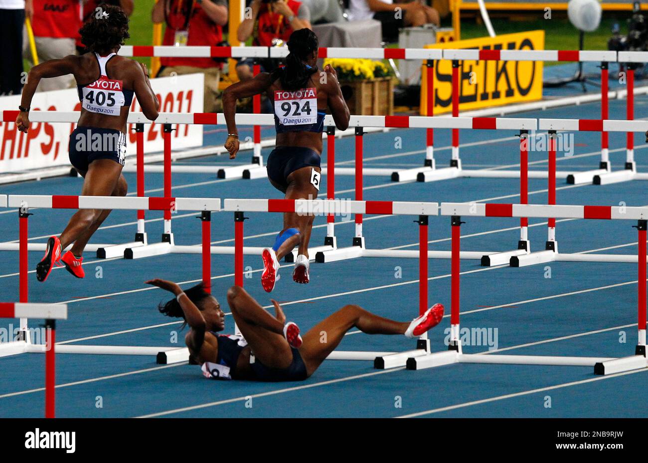 USA's Kellie Wells falls in the Women's 100m Hurdles final at the World ...