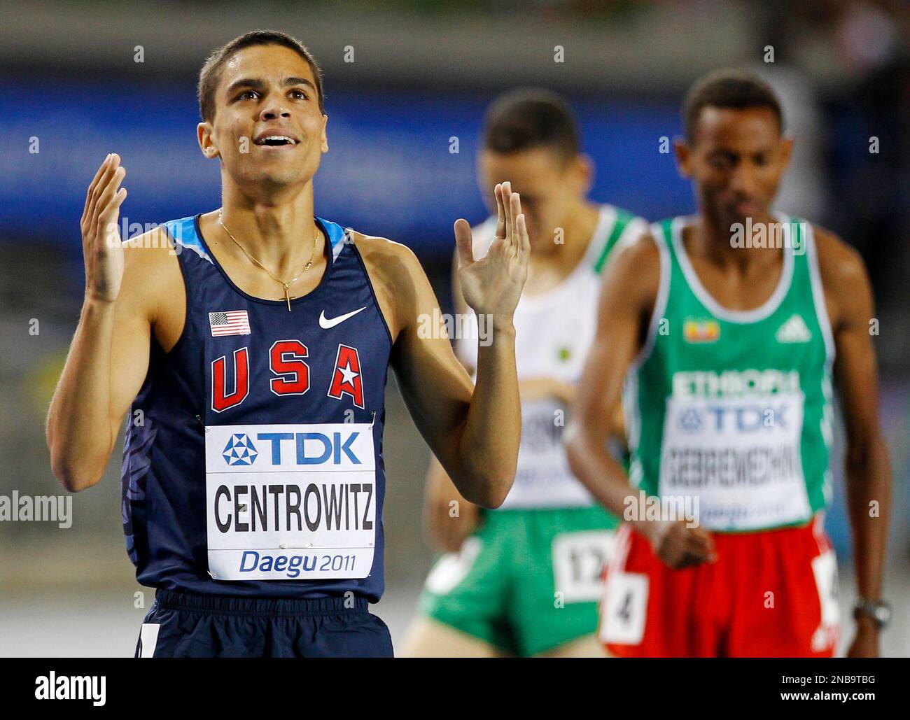 USA's Matthew Centrowitz, left, reacts after placing third in a Men's ...