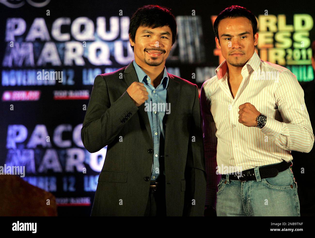 Filipino boxing icon and Congressman Manny "Pacman" Pacquiao, left, and ...