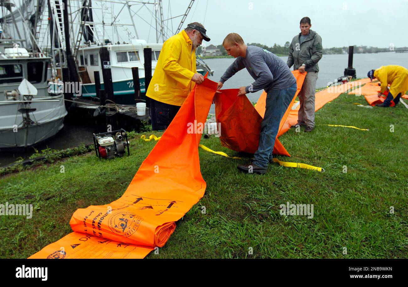 Martin Belden, right, and his son Leland Belden, of Mid Gulf Recovery ...