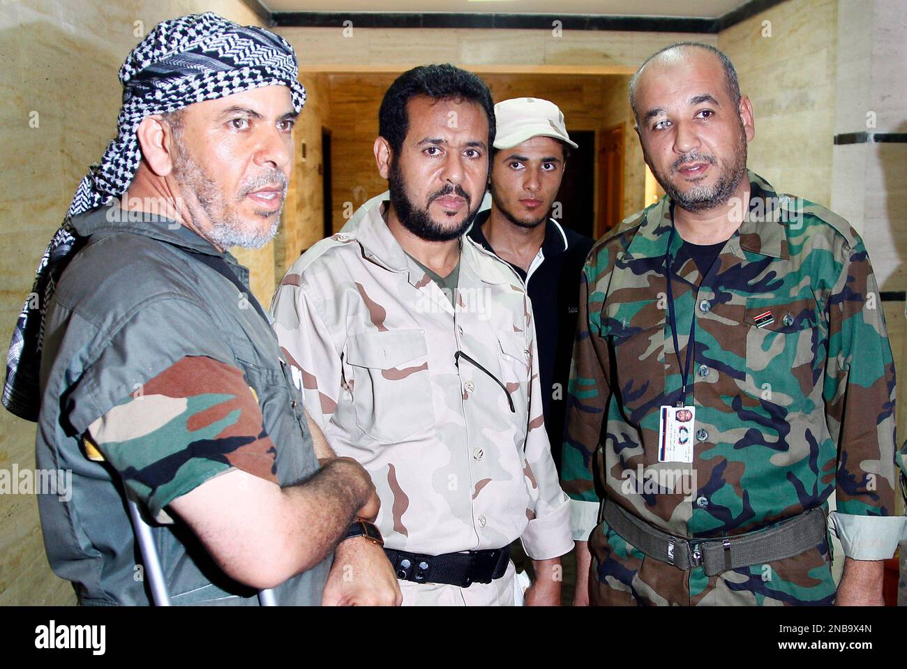 Libyan rebels' Tripoli military commander Abdel Hakim Belhaj, center ...