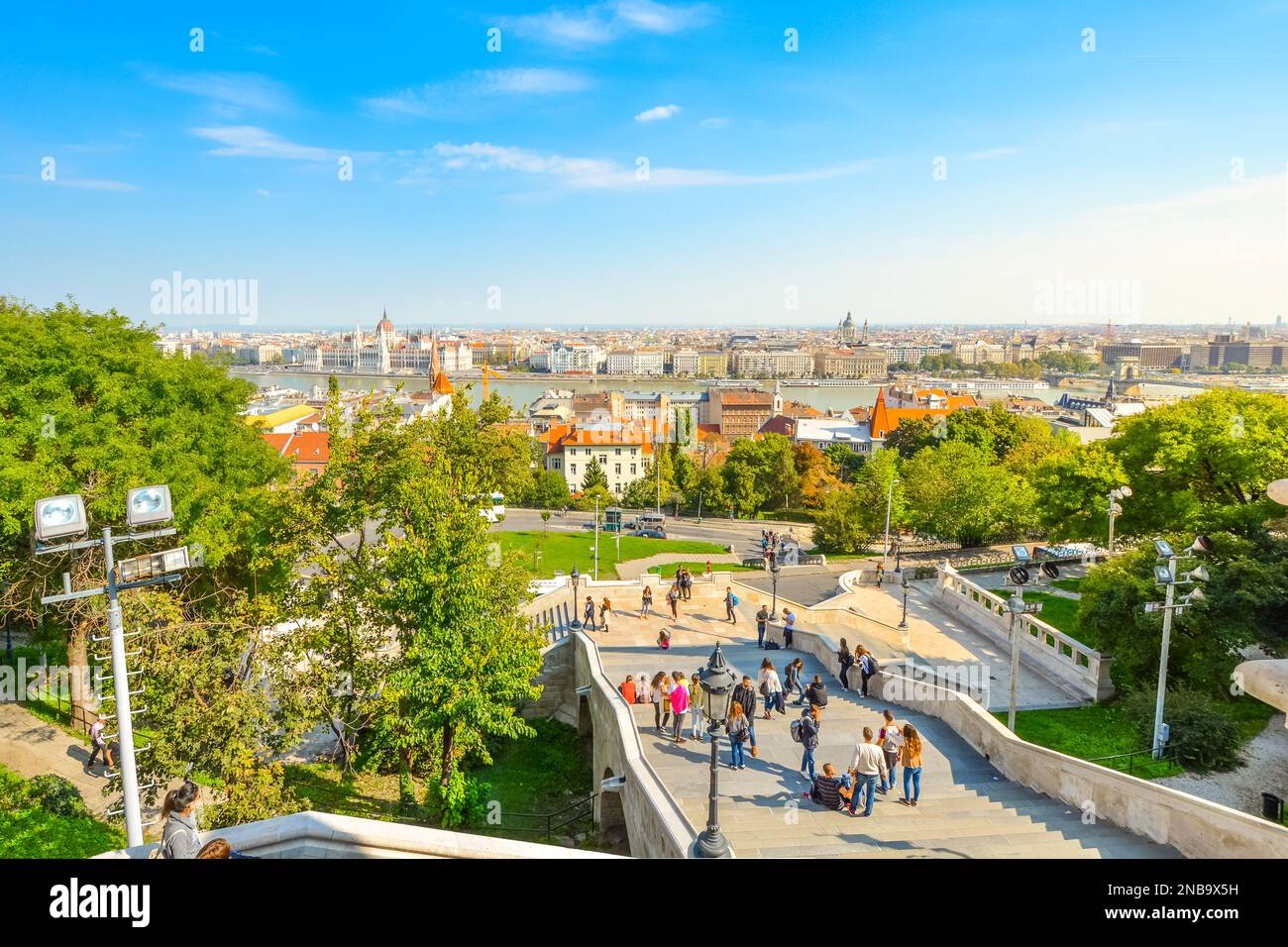 Tourists walk the long staircase from the Buda Castle Complex, with the ...