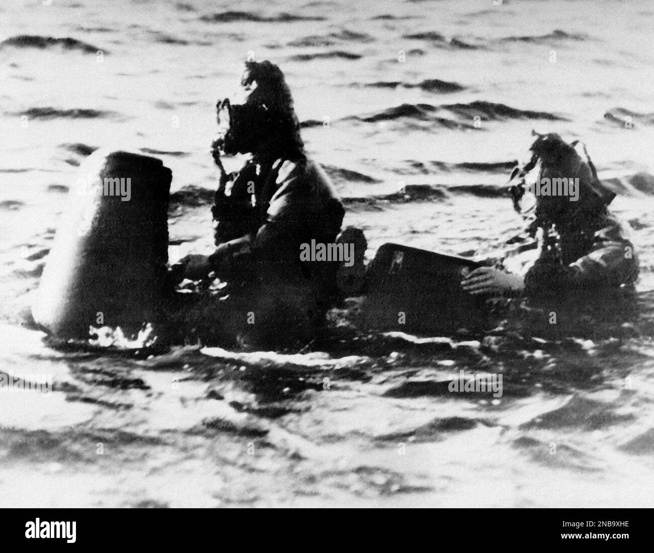 Two men in diving suits ride one of Britain's newly revealed weapons ...