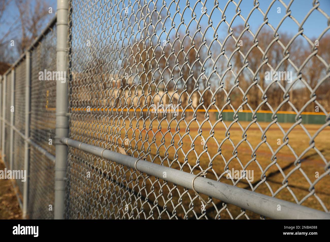 Metal chain link fence used for protection Stock Photo - Alamy