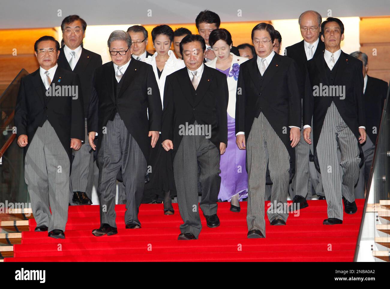 Japan's new Prime Minister Yoshihiko Noda, front row center, and his ...