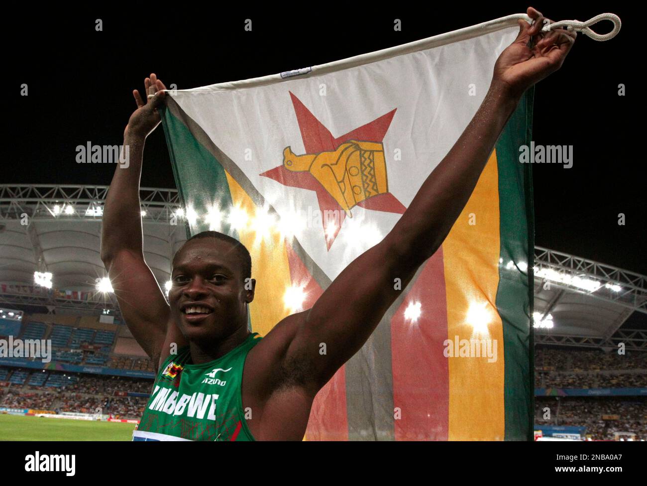 Zimbabwe's Ngonidzashe Makusha celebrates after taking bronze medal in ...