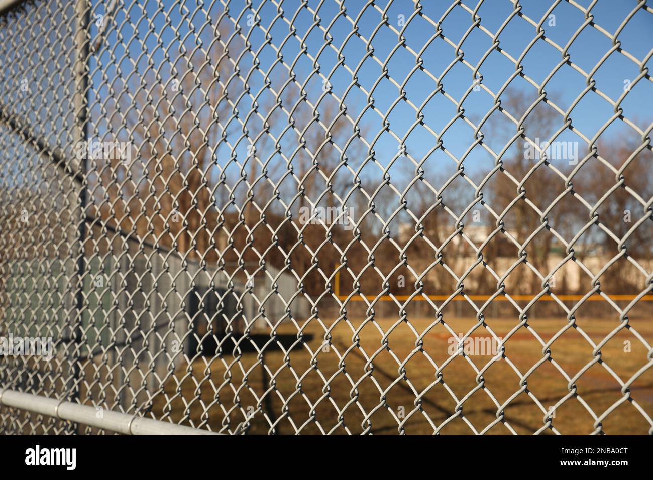 Metal chain link fence used for protection Stock Photo - Alamy