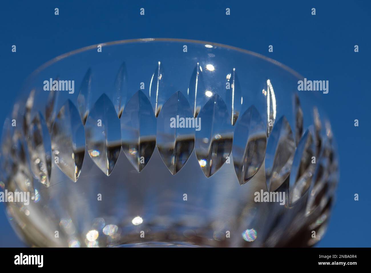 Full frame defocused macro abstract of a lead crystal glass bowl ...