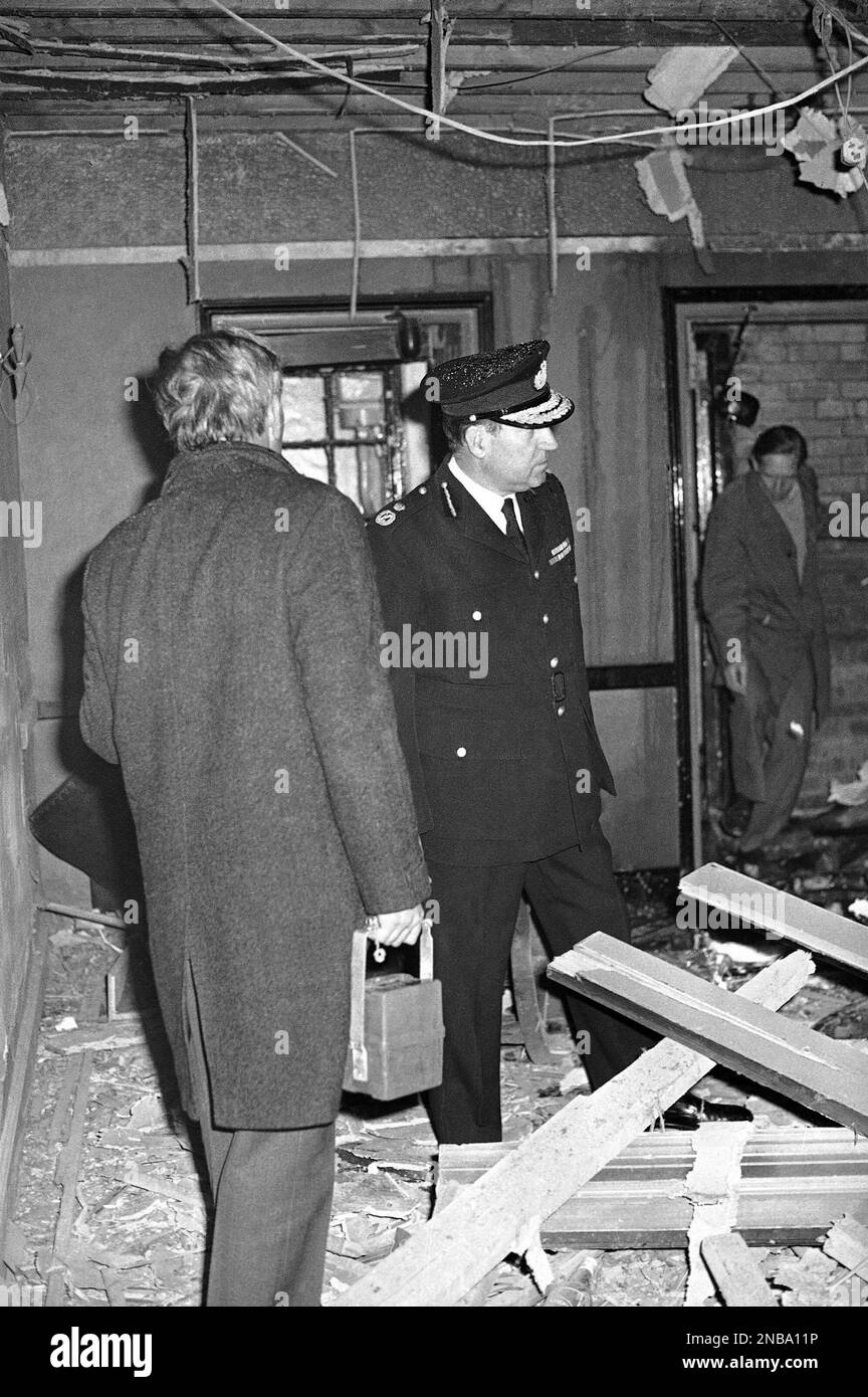 Senior police officers of London’s Bomb Squad examine wreckage of the ...