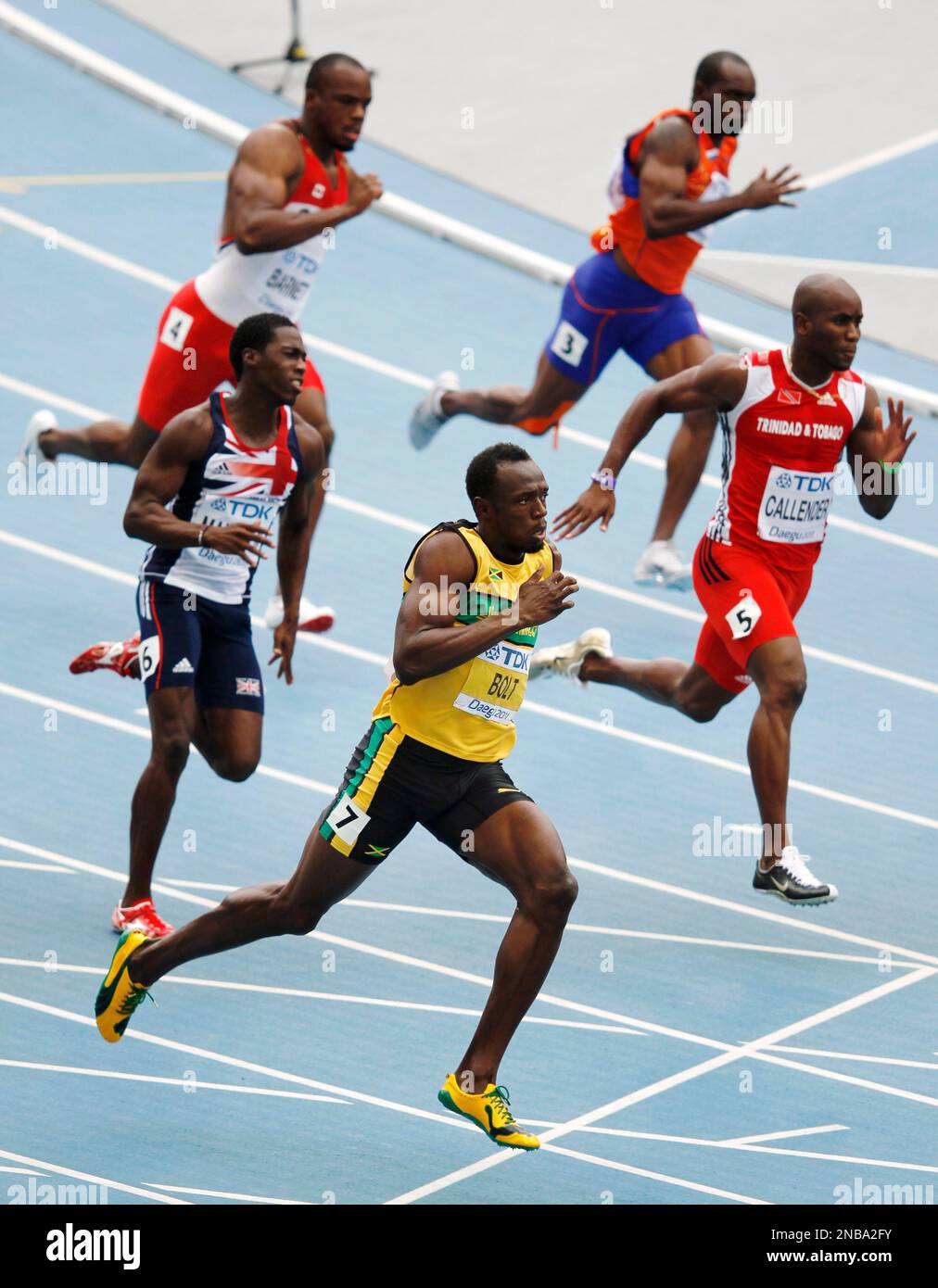 Jamaica's Usain Bolt, center front, Trinidad's Emmanuel Callender ...