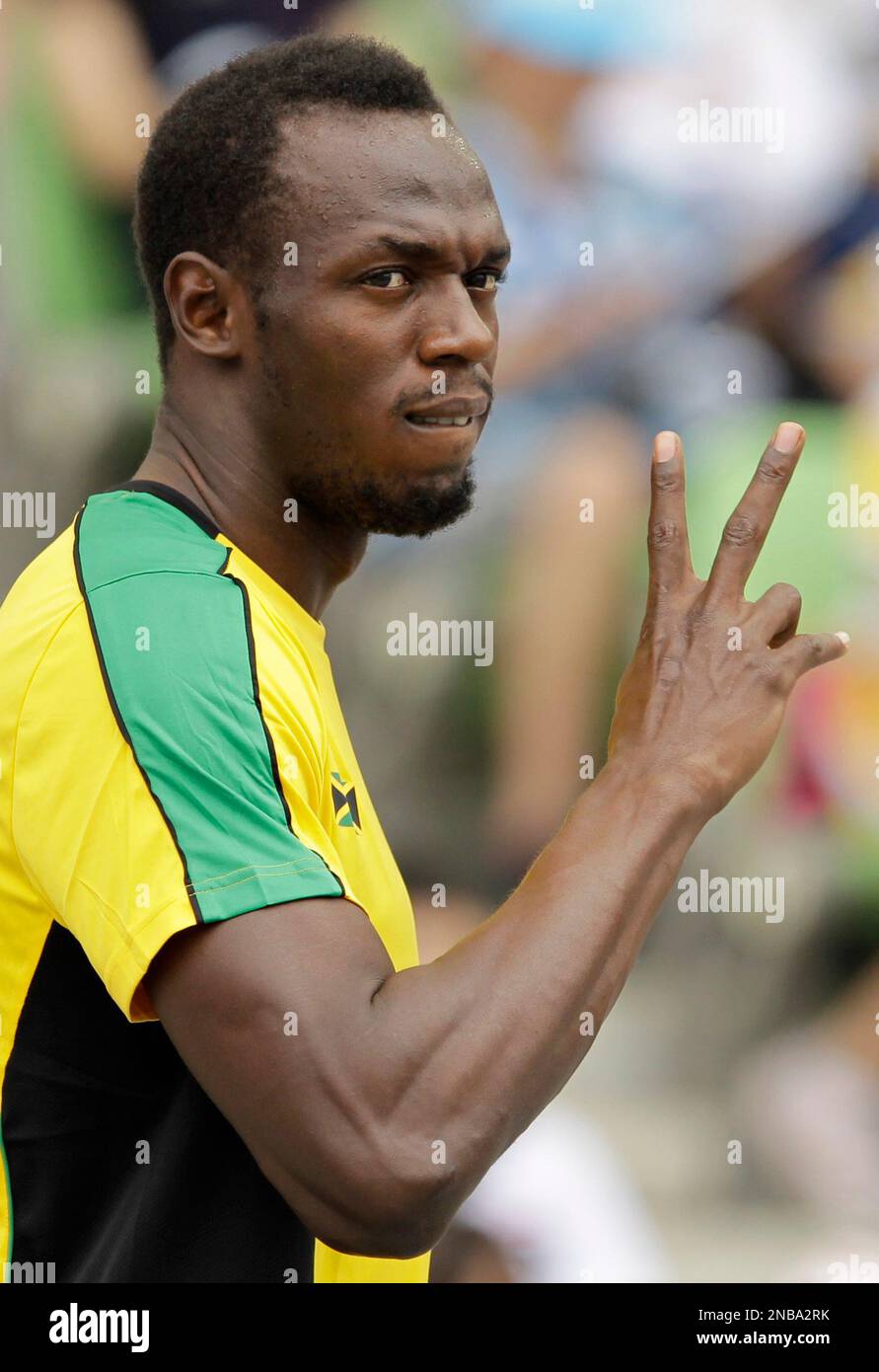 Jamaica's Usain Bolt gestures before in a first round heat of the Men's ...