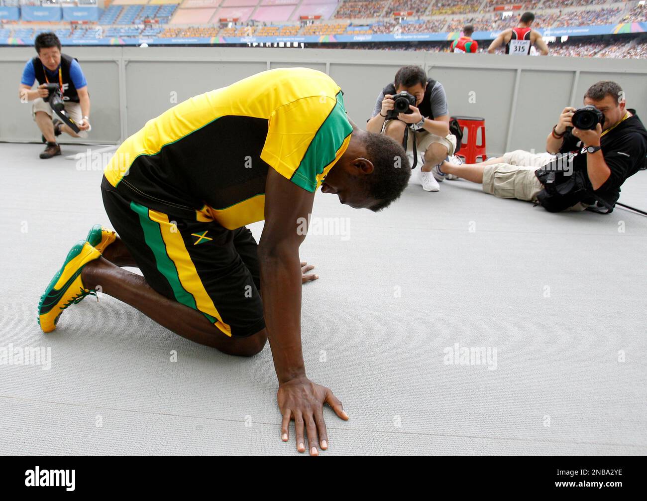Jamaica's Usain Bolt prepares to compete in a Men's 200m qualification ...
