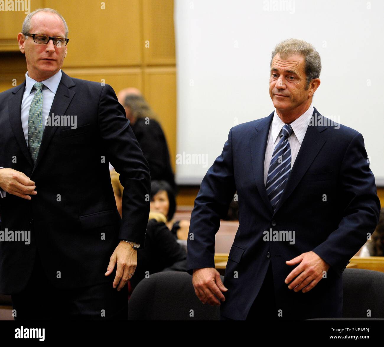 Attorney Larry Ginsberg, left, and actor Mel Gibson appear in a Los ...
