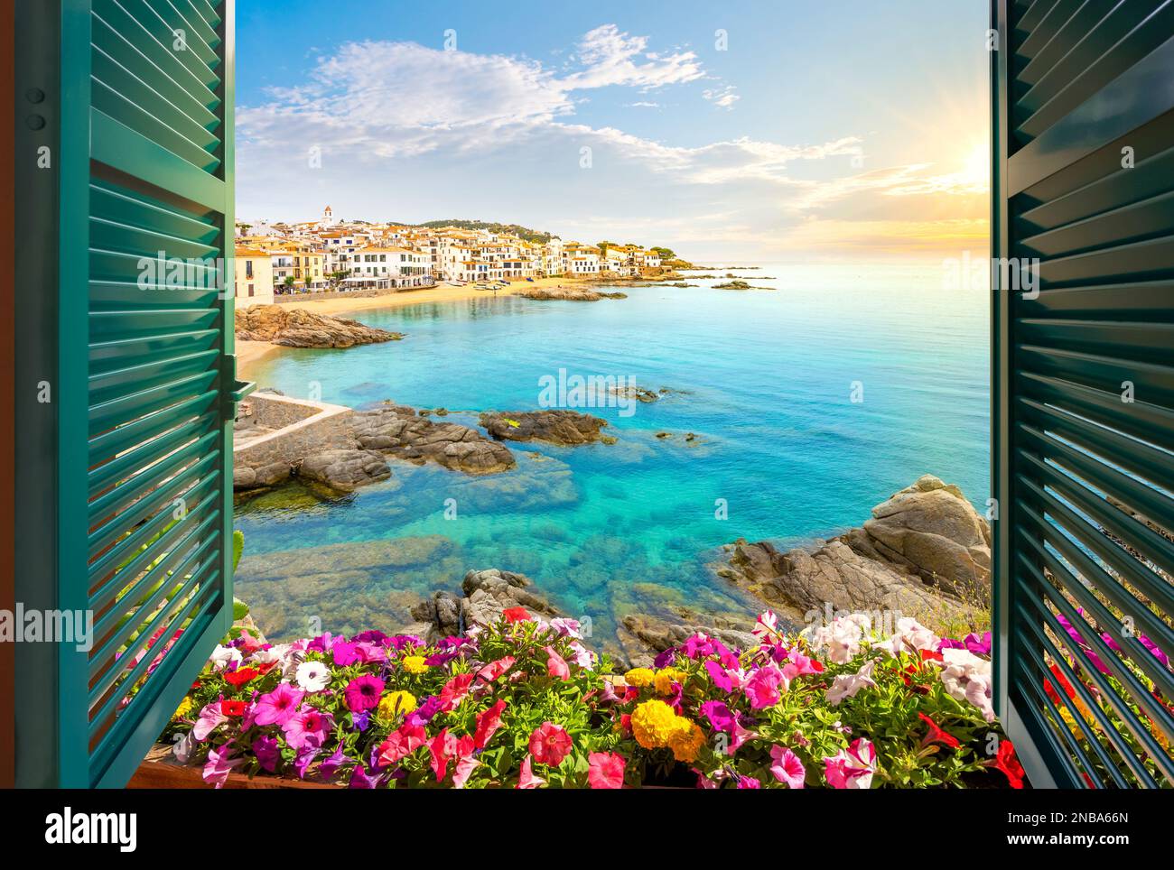 View through an open window with shutters of the whitewashed Costa ...