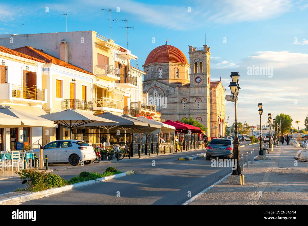 The old town waterfront harbor village of Aegina, Greece, with Saint ...