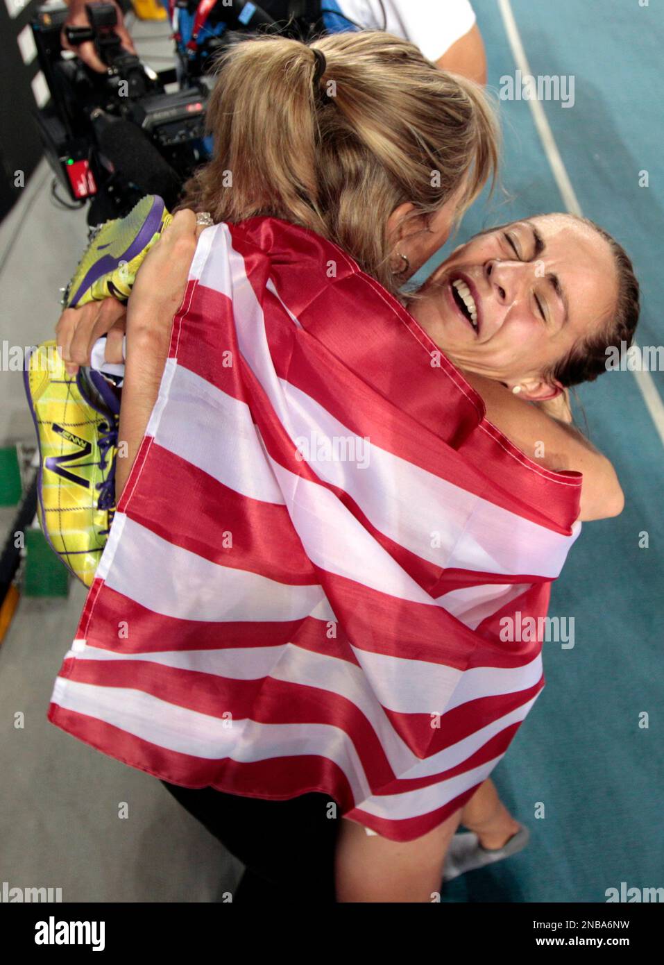 USA's Jennifer Barringer Simpson hugs an unidentified woman after ...