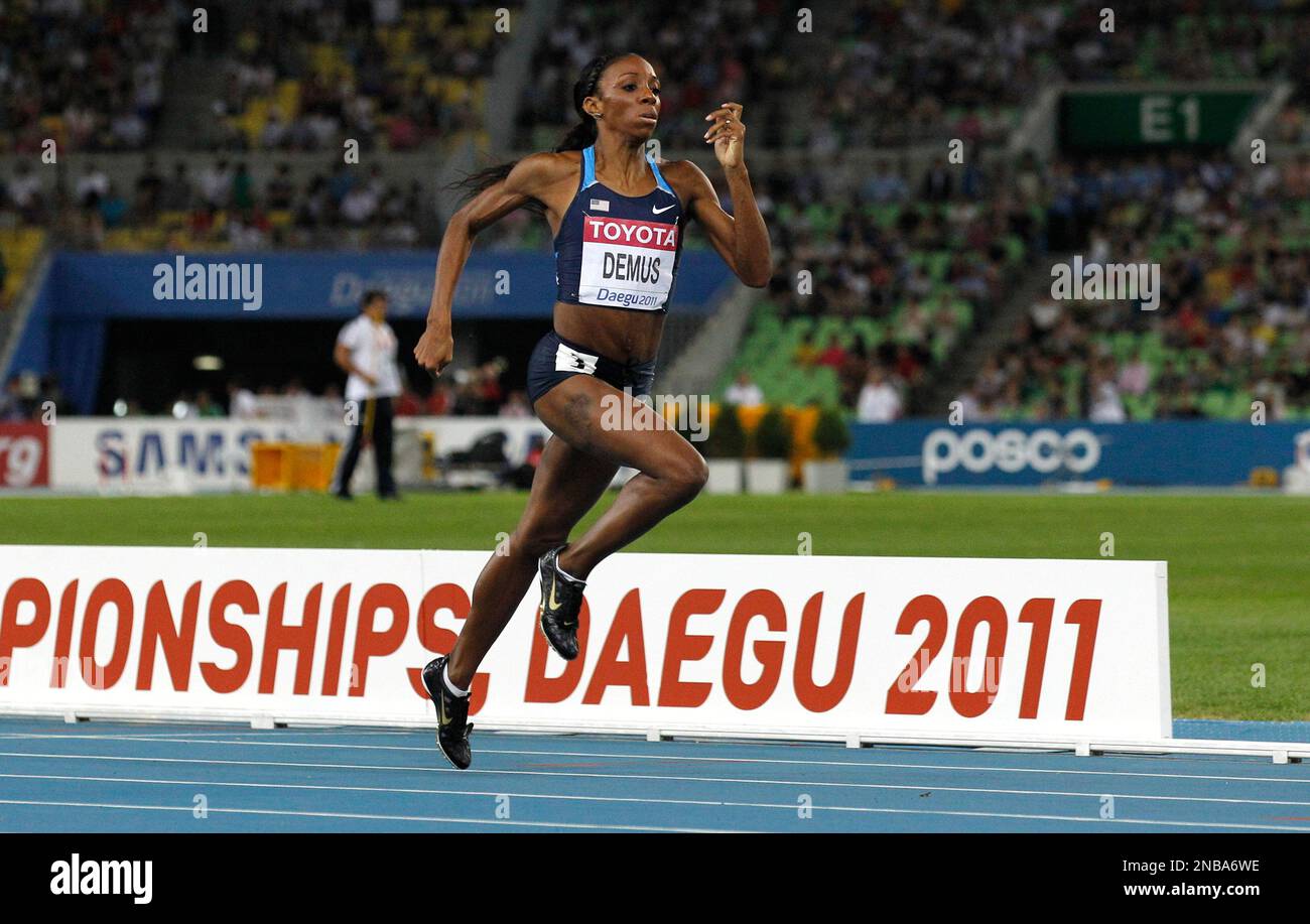 USA's Lashinda Demus goes to cross the finish line to win the Women's ...