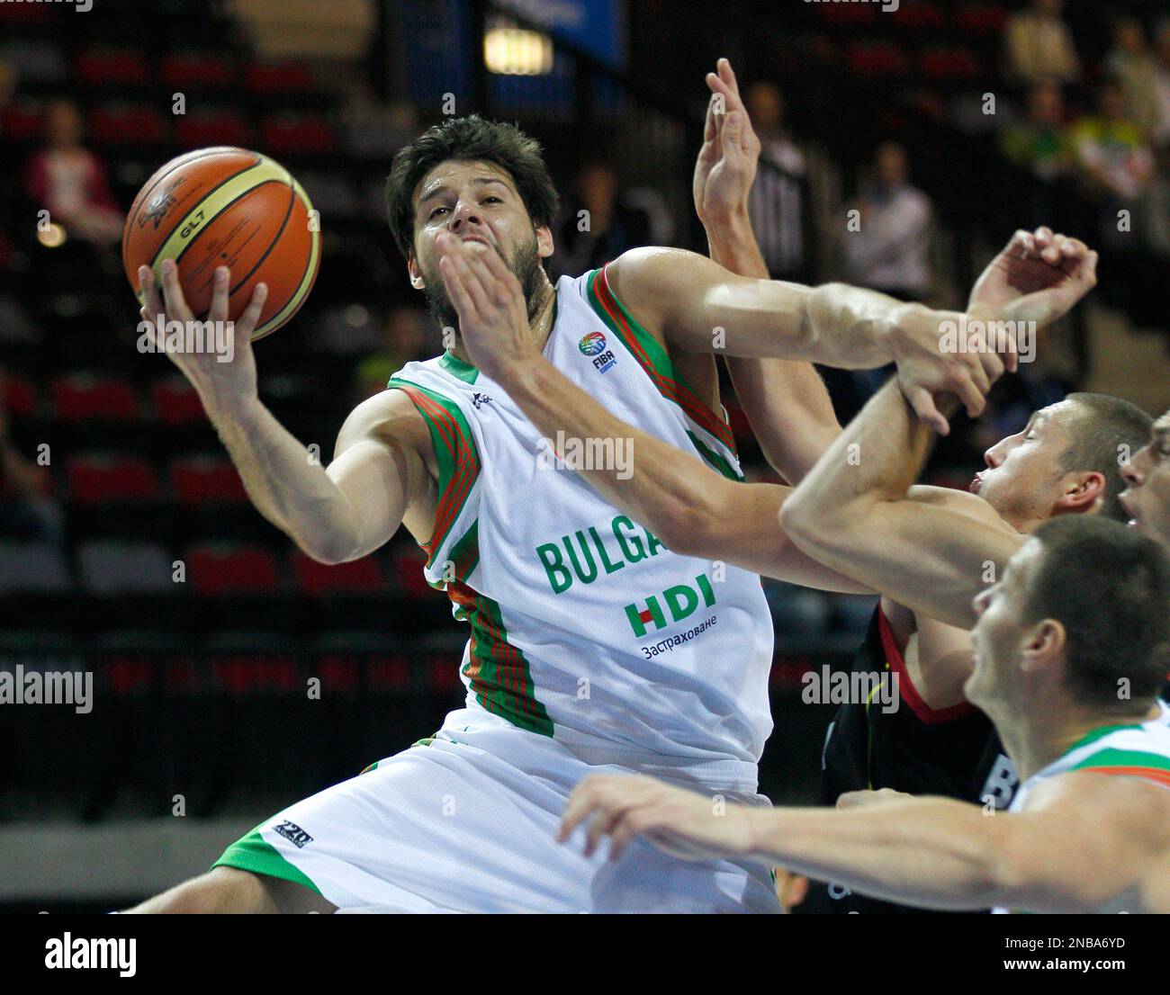 Bulgaria's Kaloyan Ivanov, left, challenges for the ball with Belgium's ...