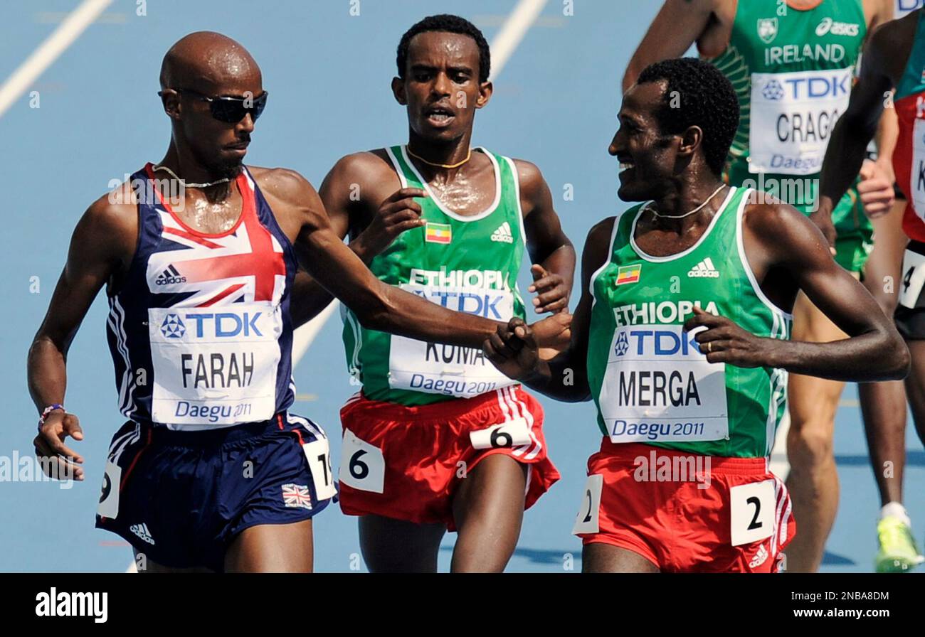 Ethiopia’s Imane Merga, right, crosses the finish line ahead of Britain ...