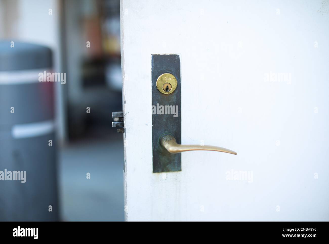 modern metal Door handle and keyhole doorknob Stock Photo - Alamy