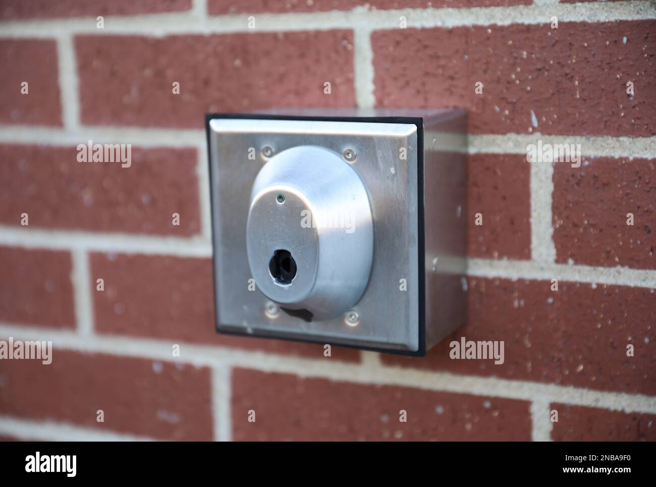 modern metal Door handle and keyhole doorknob Stock Photo - Alamy