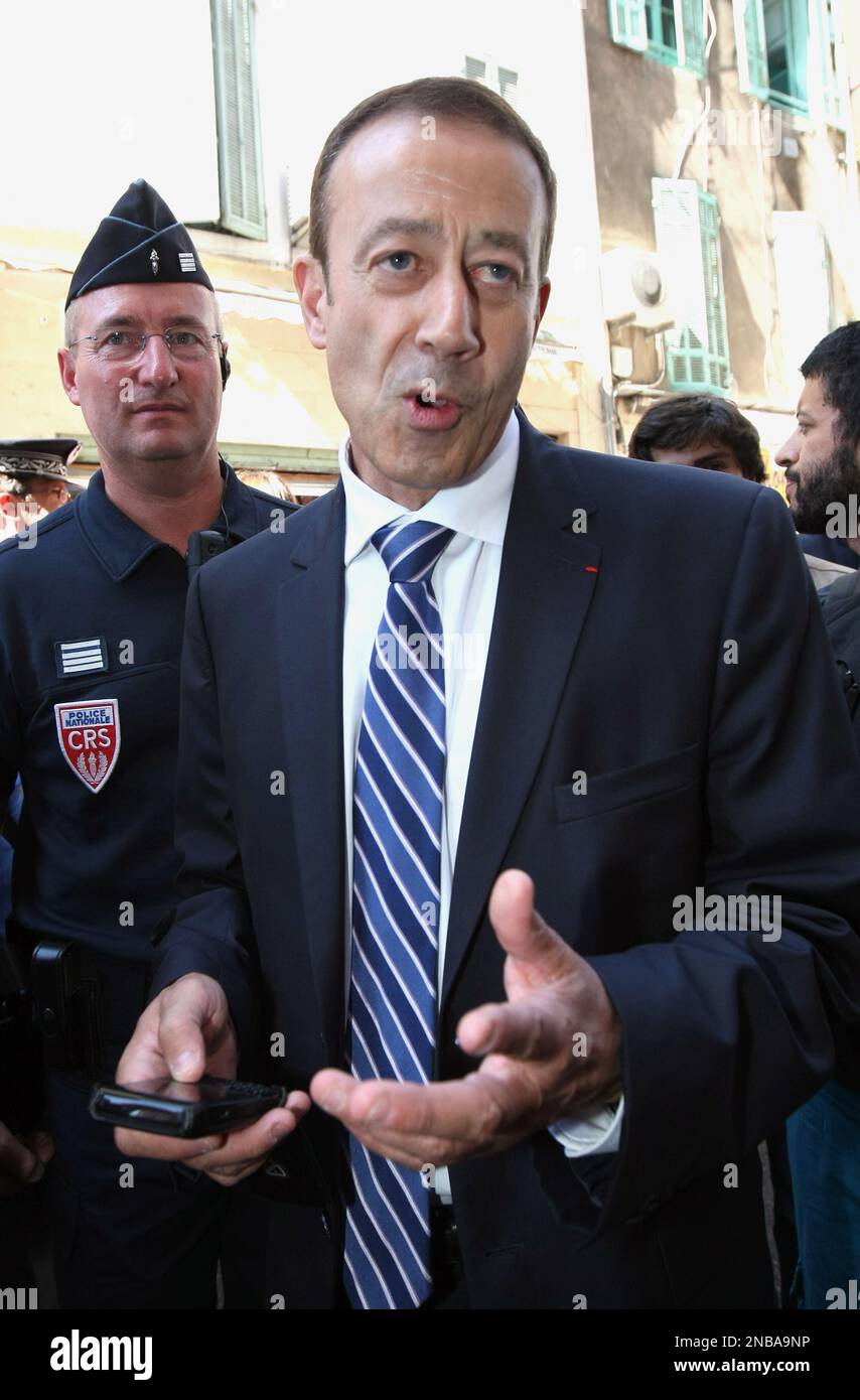 Newly named Police Prefect of Marseille, Alain Gardere, right, smiles ...