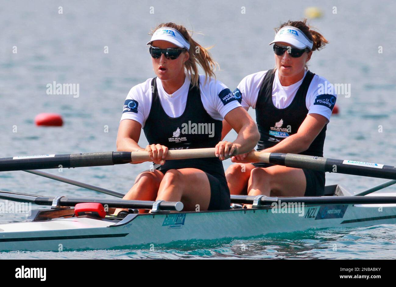 Rebecca Scown, right and Juliette Haigh from New Zealand compete in the ...