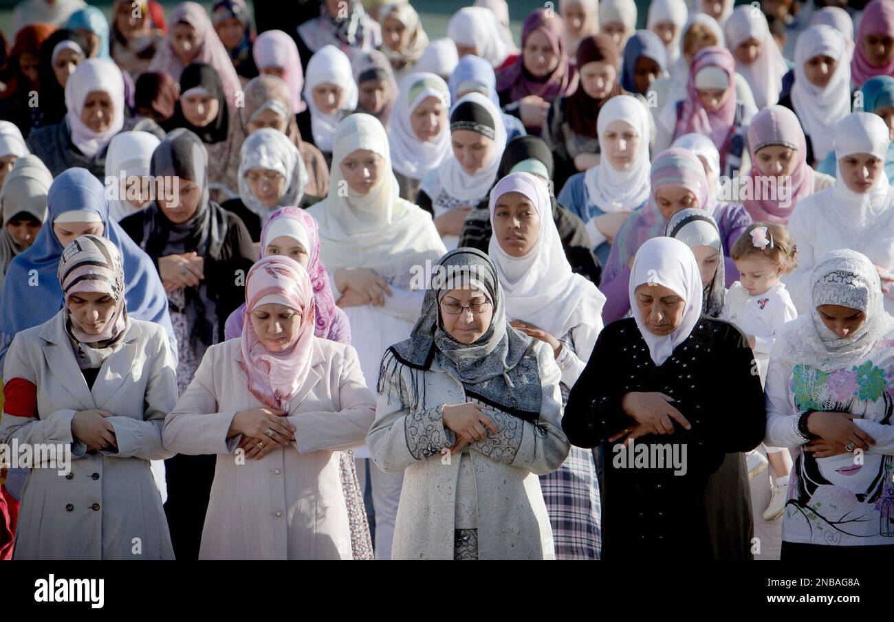 Muslim women are seen during Eid al-Fitr prayers in Bucharest, Romania ...