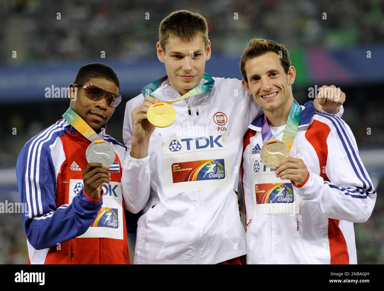 Poland's Pawel Wojciechowski, center, Cuba's Lazaro Borges, left, and ...