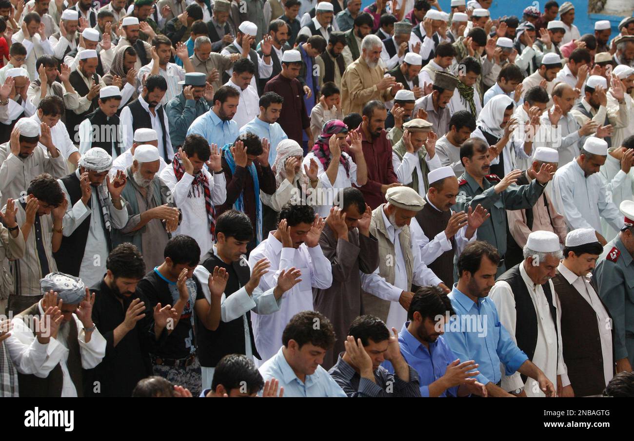 Afghan Muslims offer prayers during Eid al-Fitr prayers that marks the ...