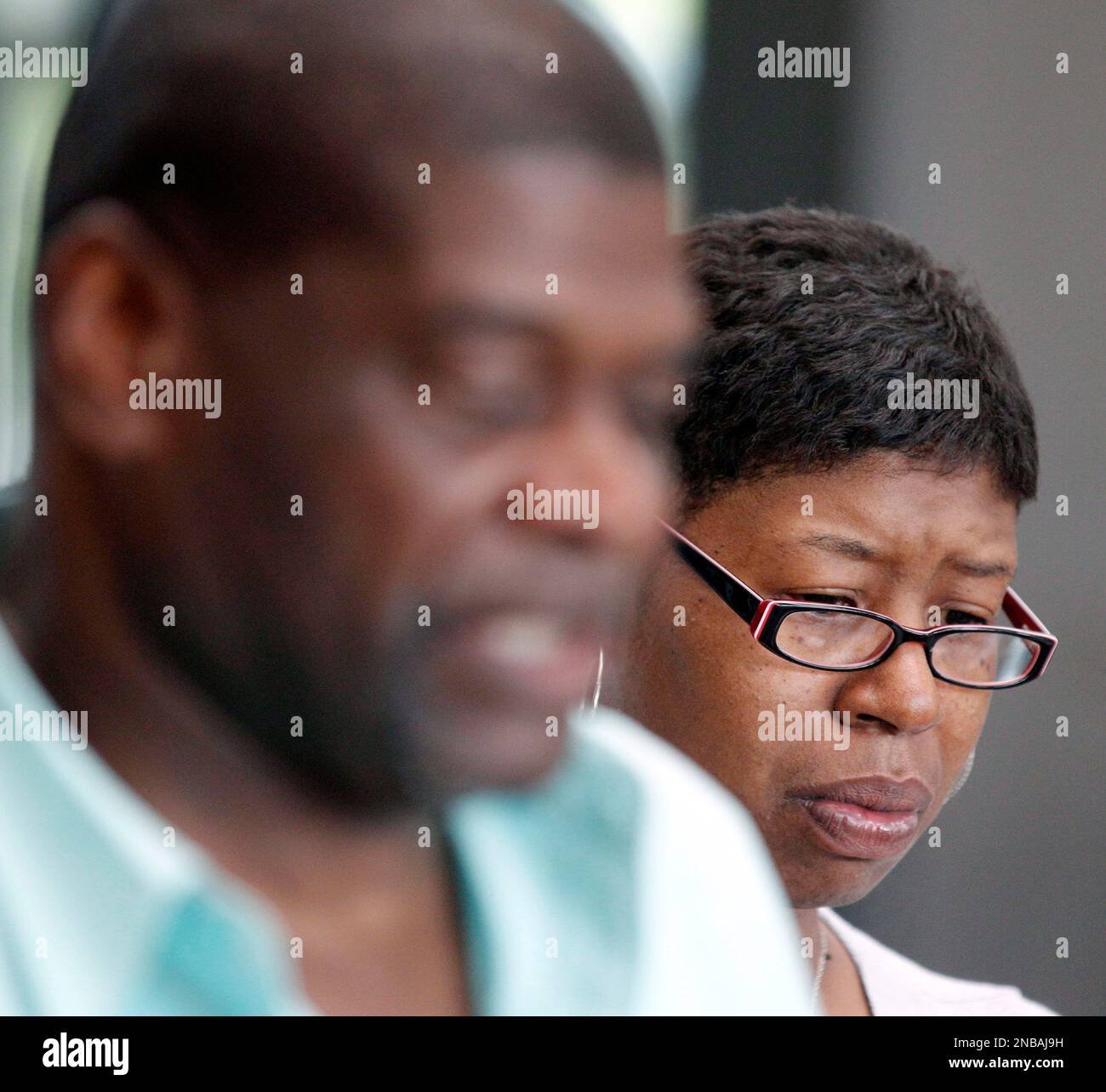 Norman Golliday, left, grandfather, and Anjanette Albert, mother of ...