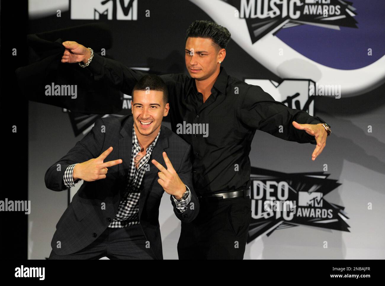 Vinny Guadagnino, left, and Paul "DJ Pauly D" DelVecchio pose backstage ...