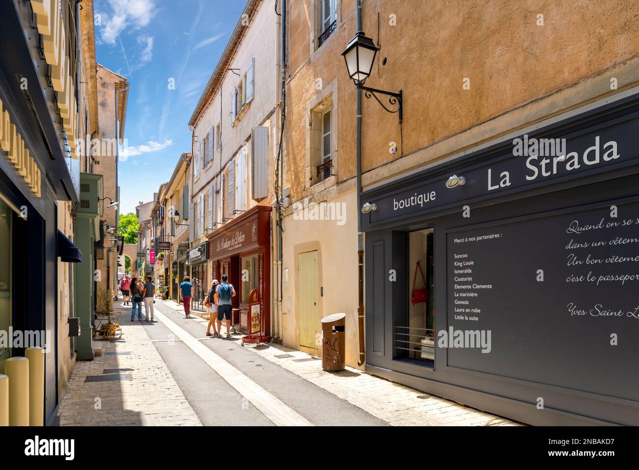 One of the many typical streets and alleys of colorful sidewalk cafes ...