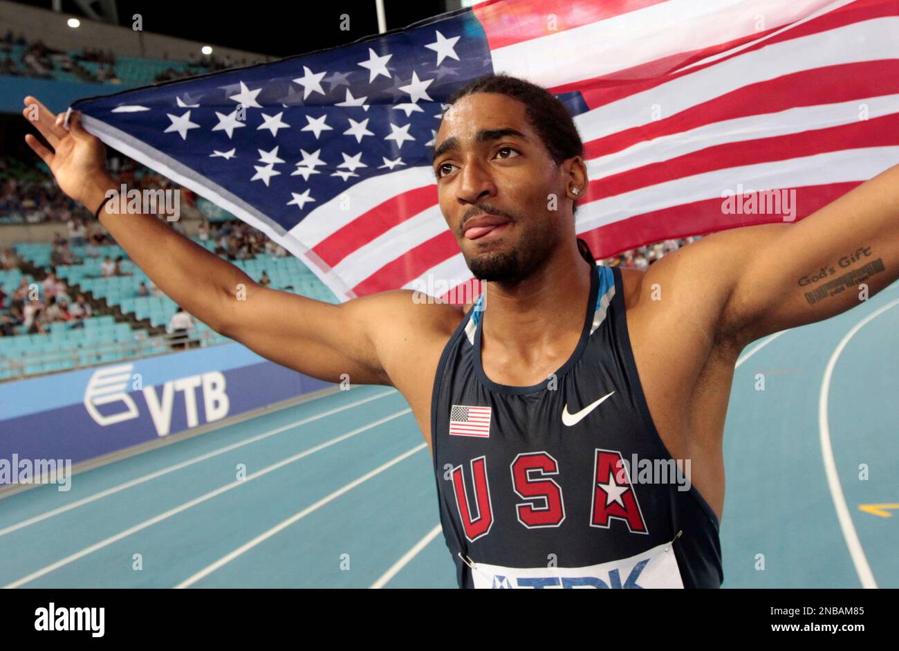 USA's Jason Richardson reacts with American flag after the Men's 110m ...