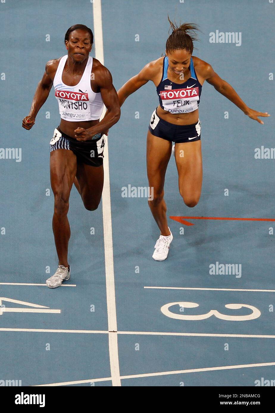 Botswana's Amantle Montsho, left, crosses the finish line ahead of USA ...