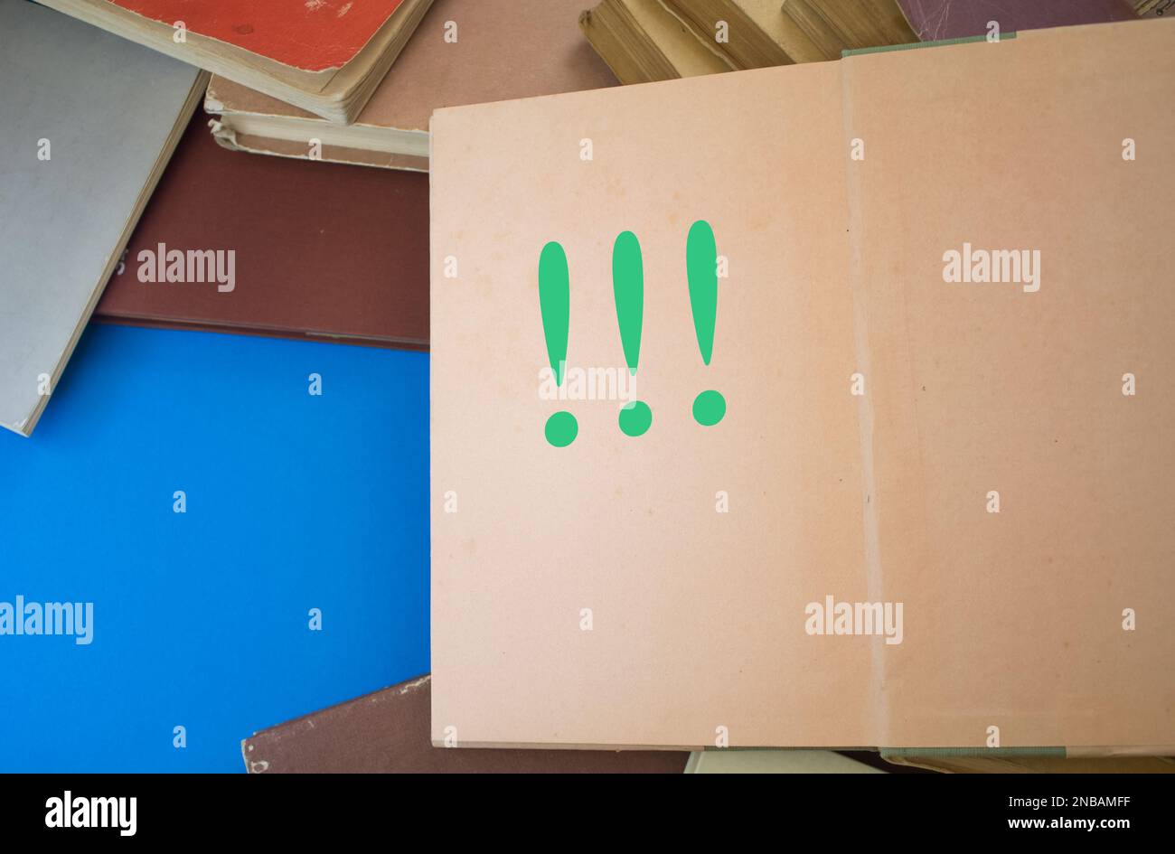 Exclamation mark word in opened book with vintage, natural patterns old ...