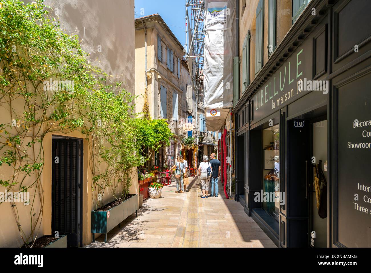 One of the many typical streets and alleys of colorful sidewalk cafes ...