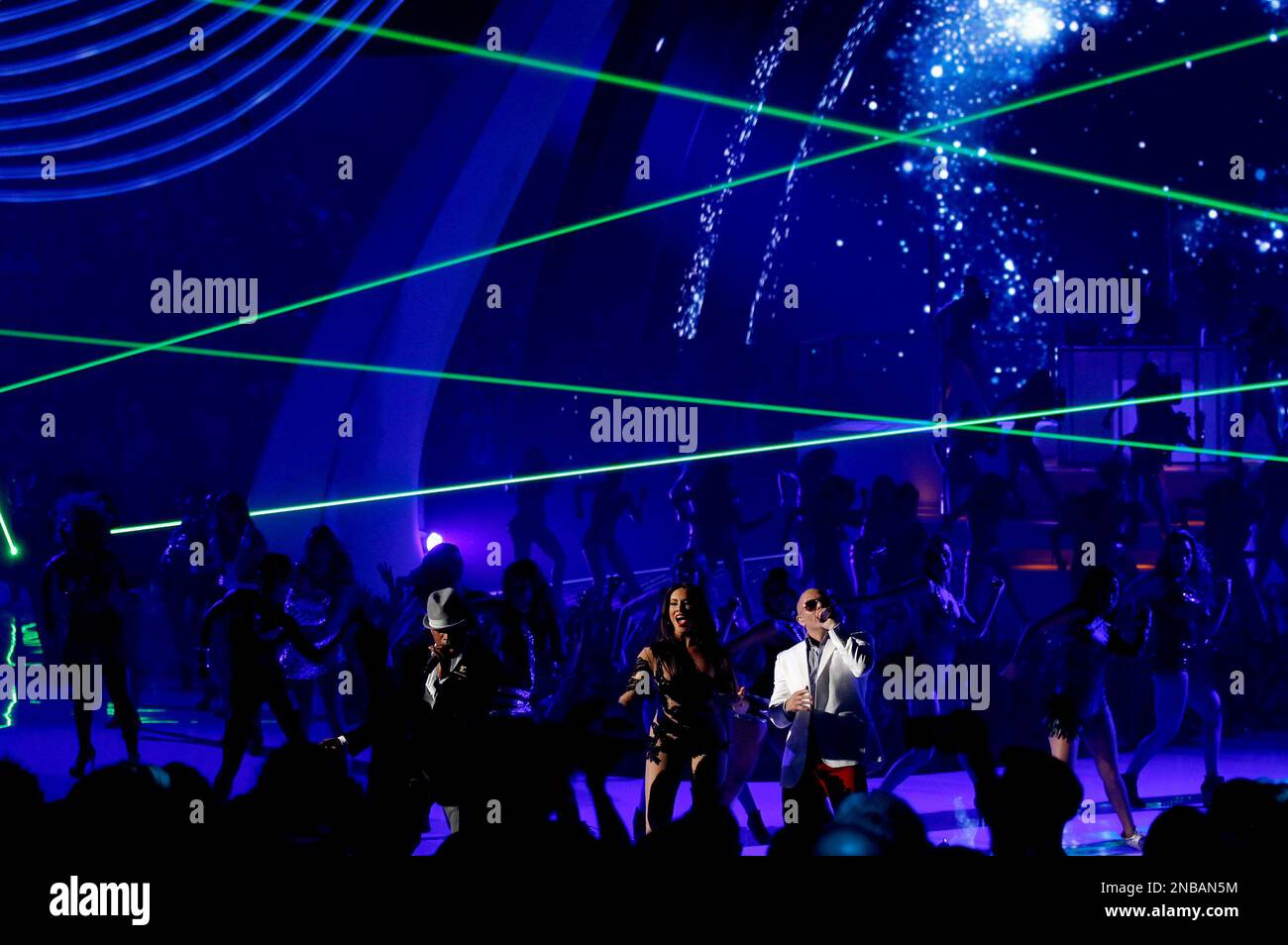 Ne-Yo, left, and Pitbull, right, perform onstage at the MTV Video Music ...