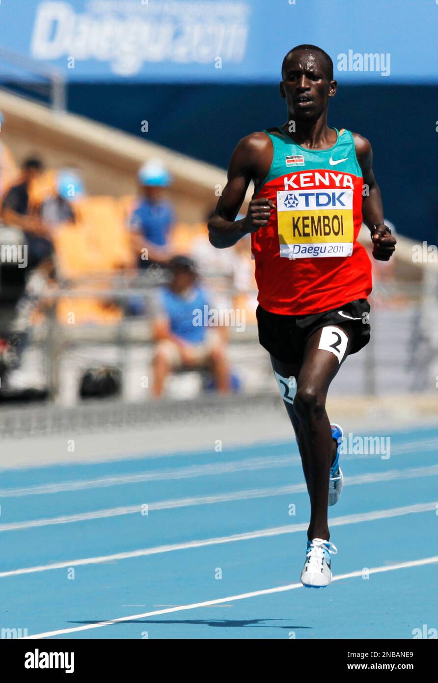 Kenya's Ezekiel Kemboi goes to cross the finish line in a heat of the ...