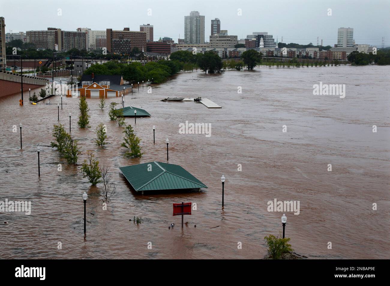 Downtown New Brunswick, N.J., can be see near the overflowing Raritan ...
