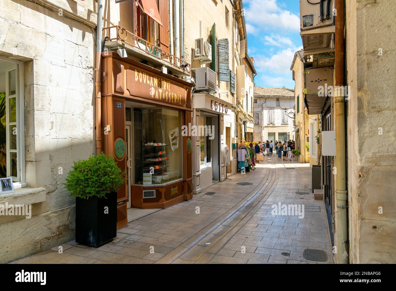 One of the many typical streets and alleys of colorful sidewalk cafes ...