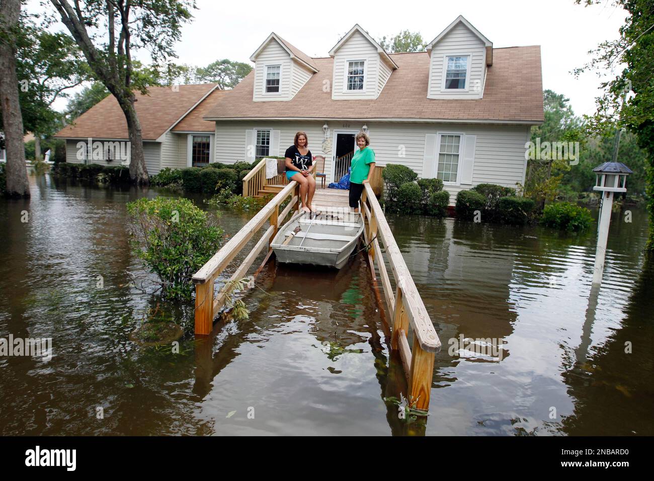 Lechelle, right, and her daughter Haleigh Spalding sit in front of ...