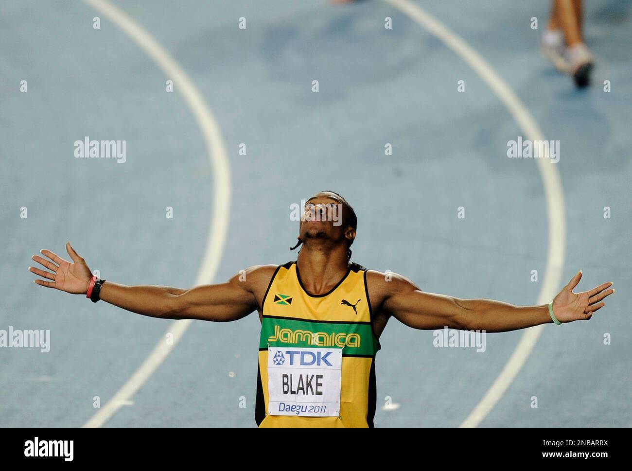 Jamaica's Yohan Blake celebrates winning gold in the Men's 100m final ...