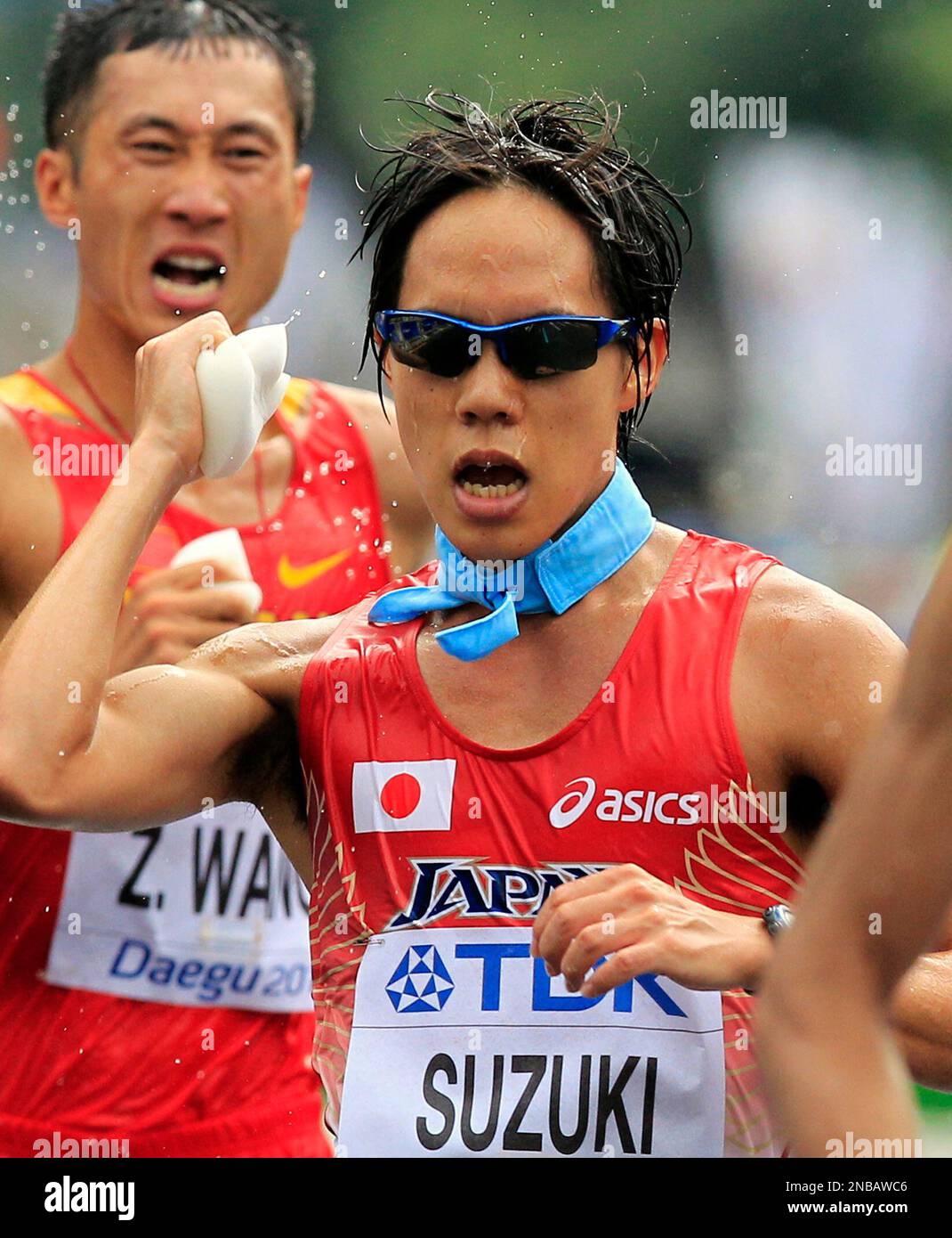 Japan's Suzuki Yusuke cools down as he competes in the Men's 20km Race ...