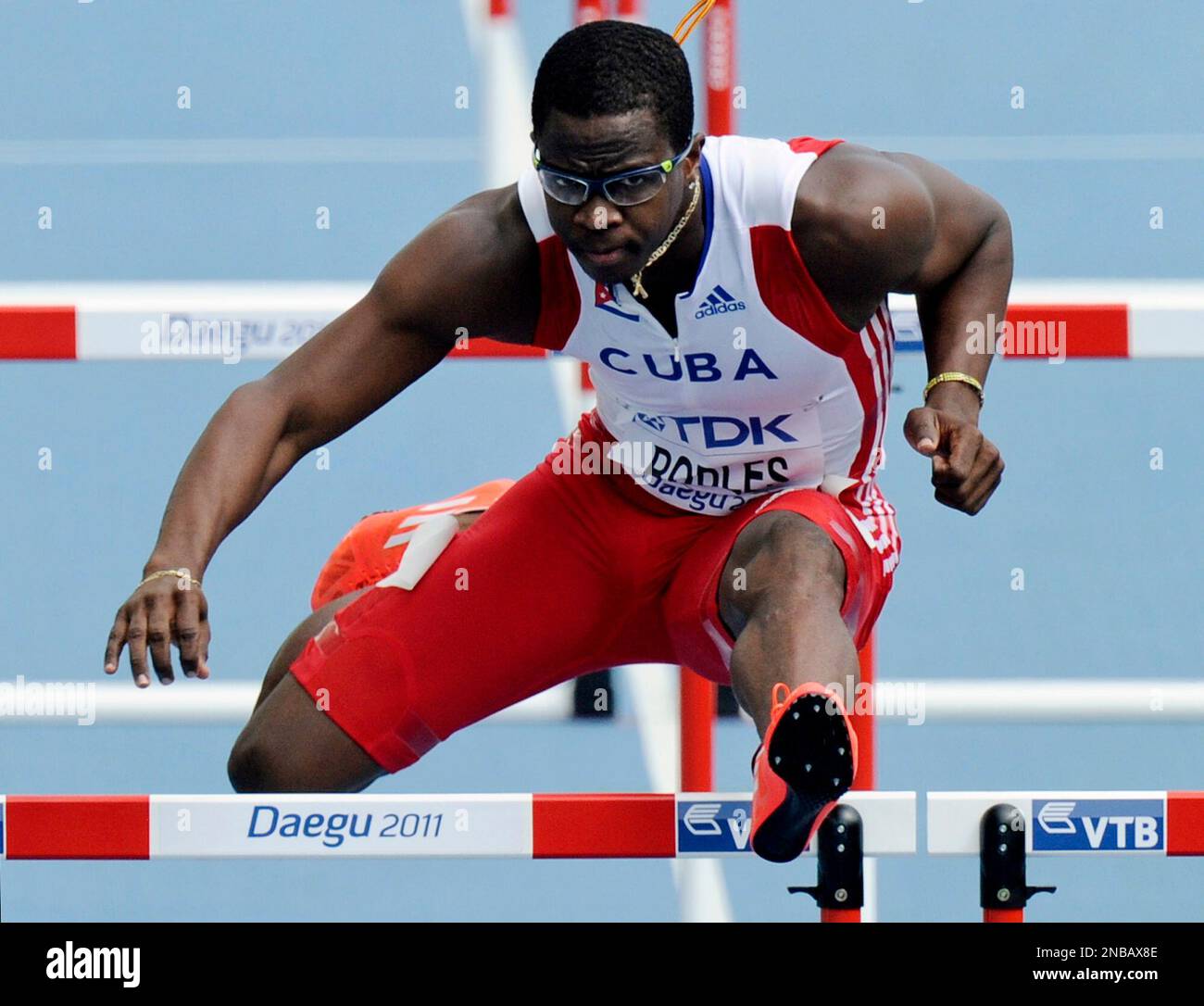 Cuba's Dayron Robles competes in a heat of the 110m Hurdles at the ...